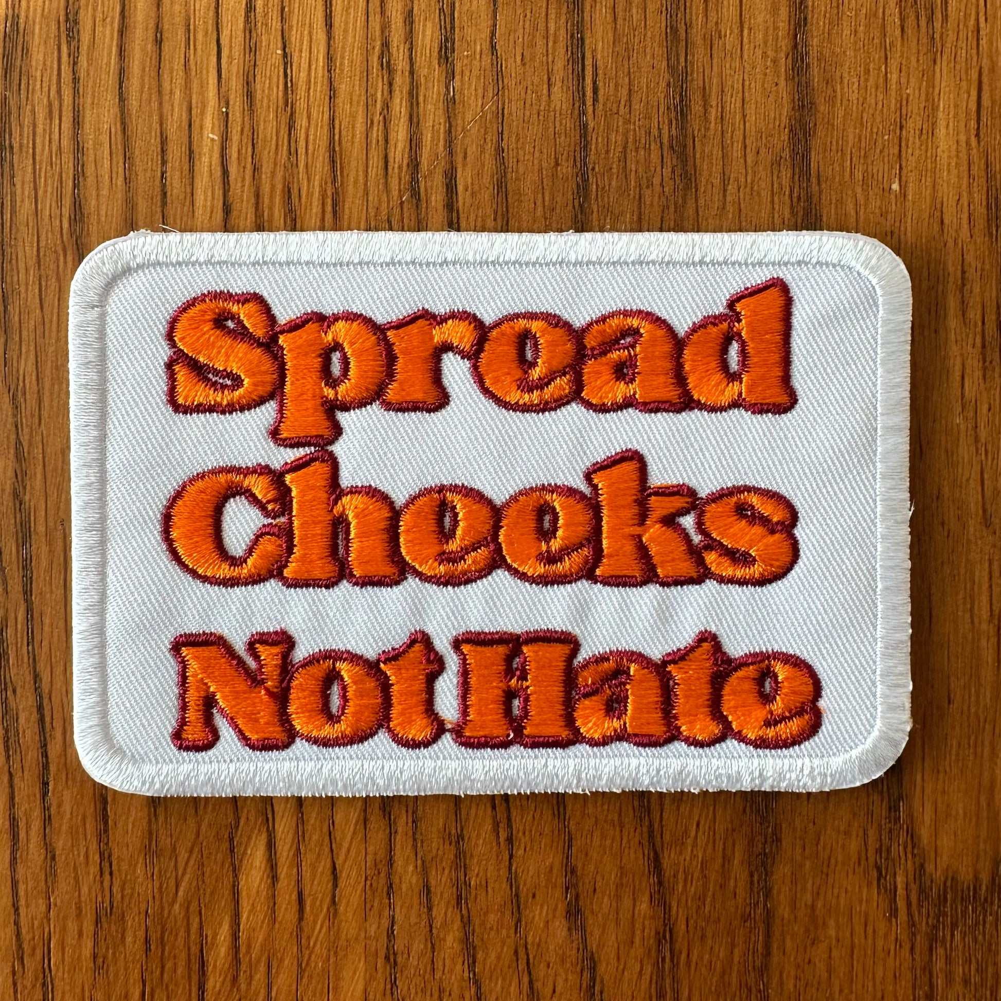 Spread Cheeks Not Hate Patch – Rusty Lids