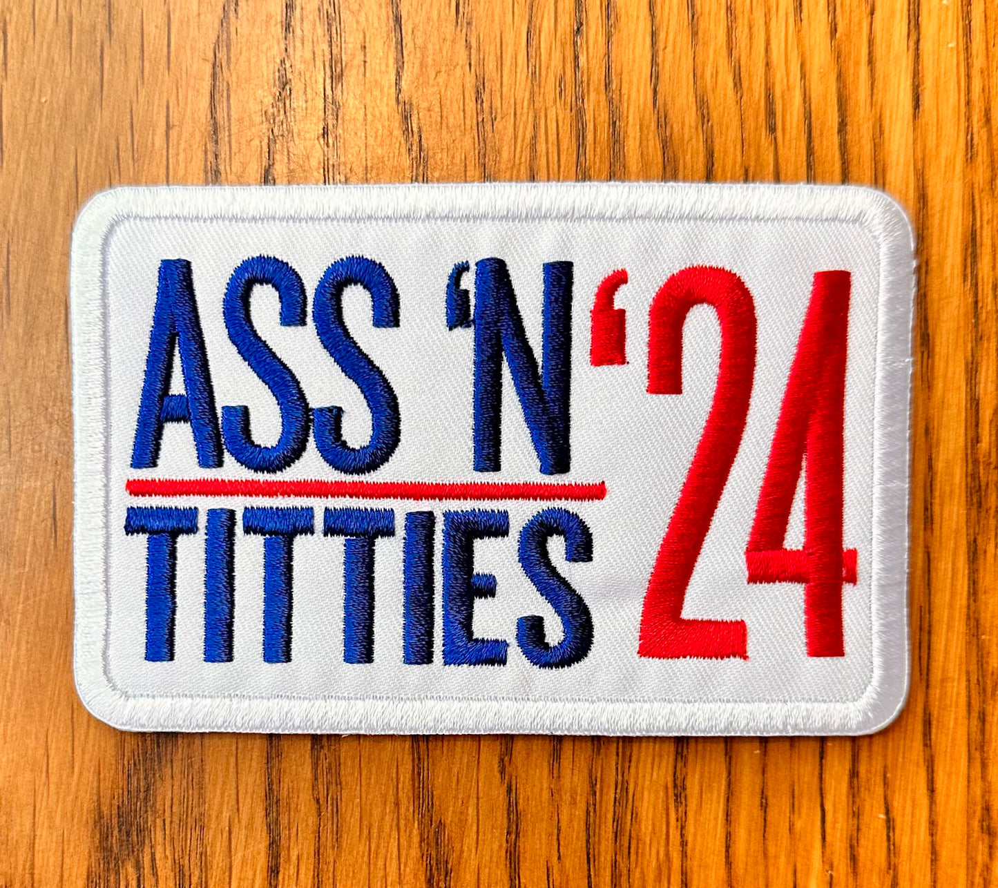 Ass ‘N Titties ‘24 Patch – Rusty Lids